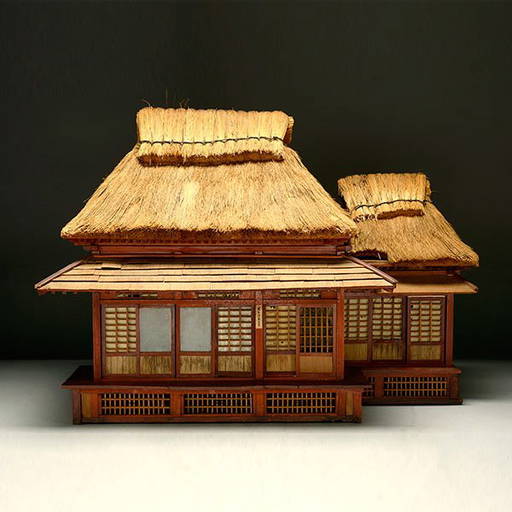 A Scale Model Of A Thatched Cottage