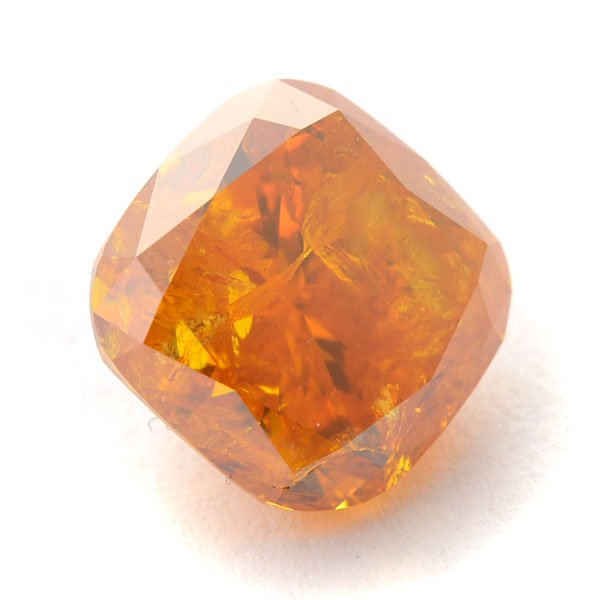 Unmounted Natural Fancy Deep Yellowish Orange Diamond.