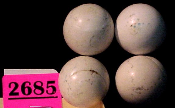 2685: Four Hand Made China Marbles