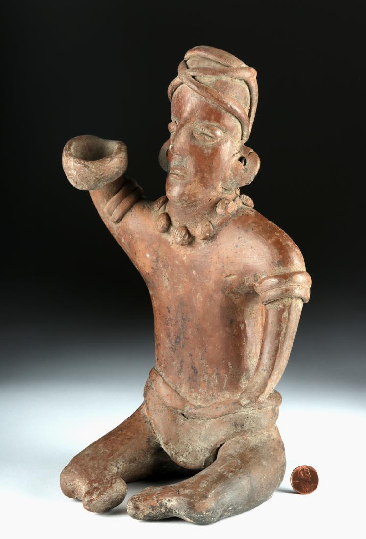 Colima Pottery Seated Male Figure