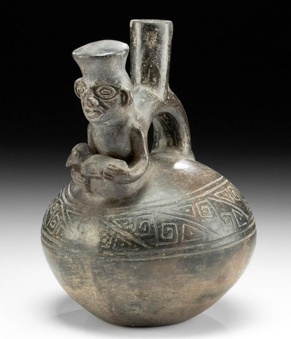 Chimu Blackware Stirrup Vessel w/ Figure, ex-Museum | Barnebys