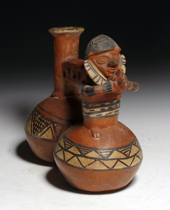 An Inca Polychrome Twin-Lobed Whistling Vessel