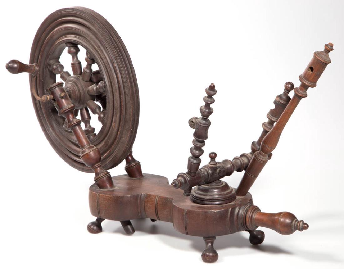 TURNED AND CARVED WALNUT TABLE-TOP SPINNING WHEEL
