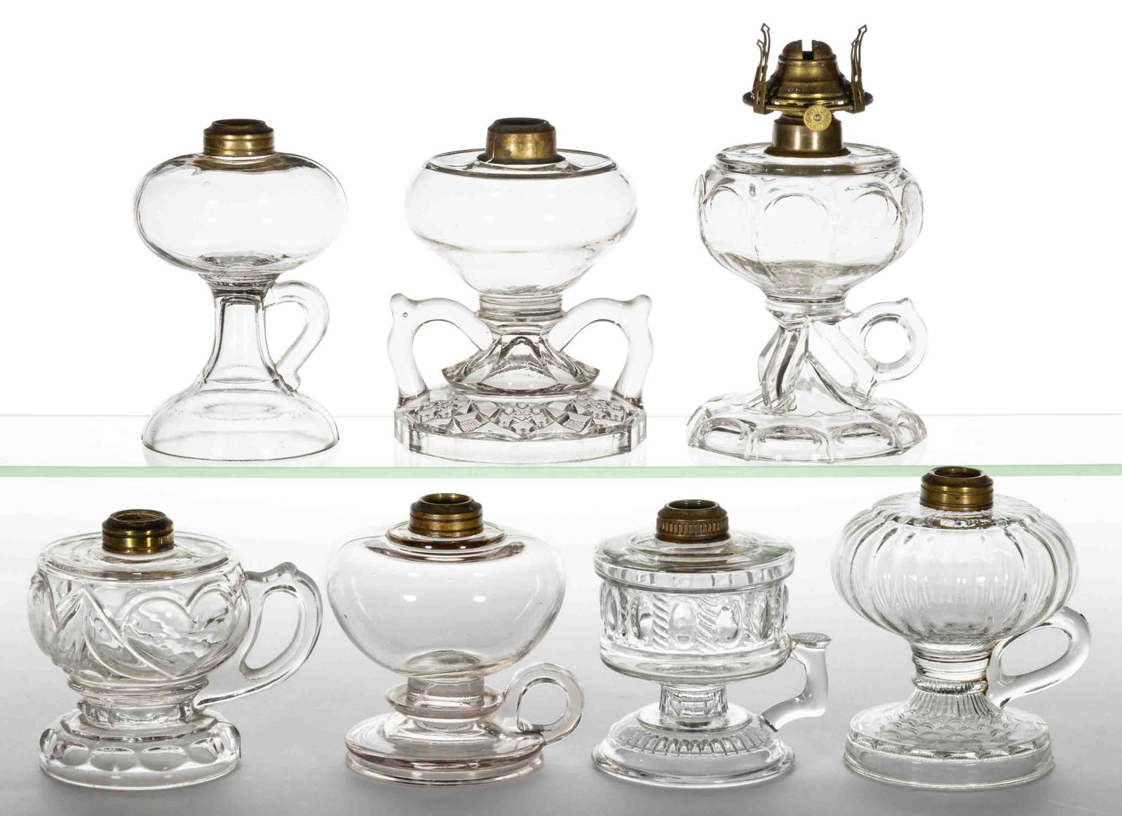 ASSORTED GLASS KEROSENE FOOTED FINGER LAMPS, LOT OF SEVEN - Mar 24 ...