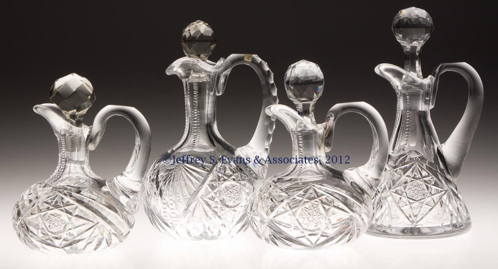 27: FRY AND OTHER CUT GLASS CRUETS, LOT OF FOUR