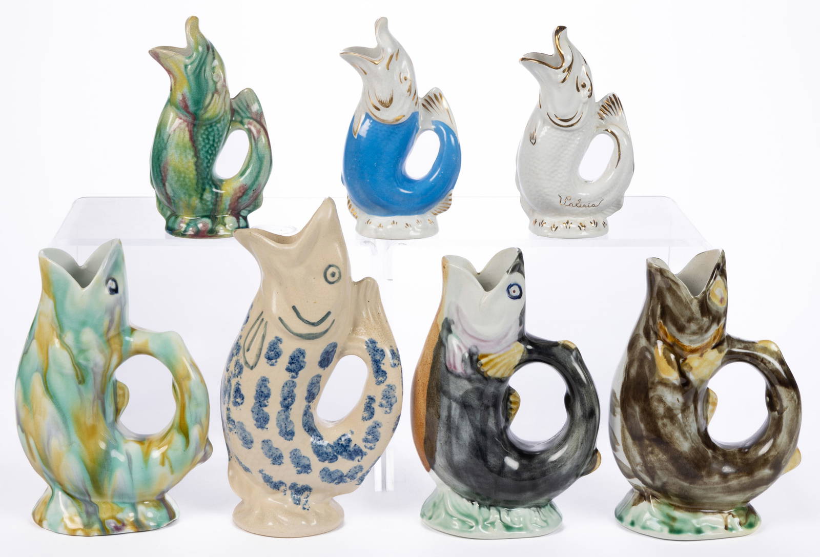 Ohio Decorated Ceramic Fish Pitchers, Lot Of Seven Auction