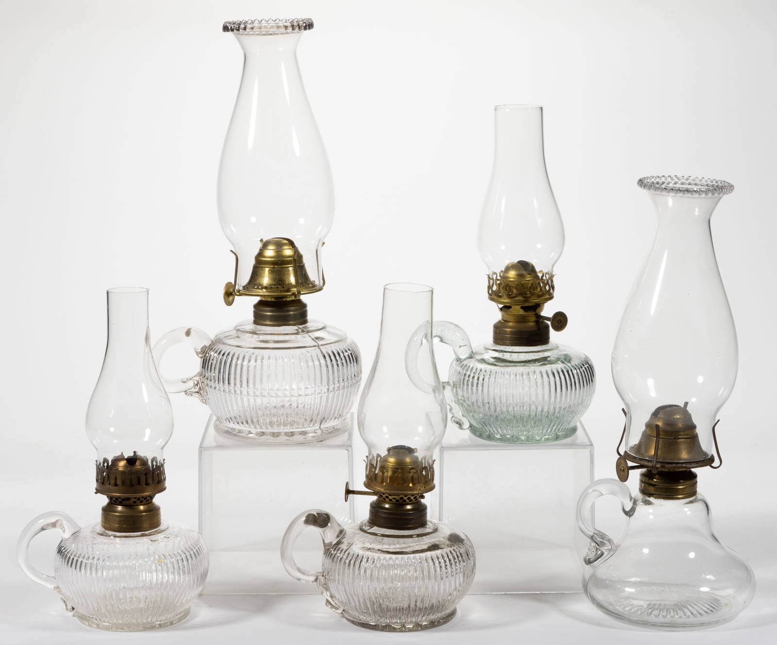 Assorted Ribbed Patterned Kerosene Finger Lamps, Lot Of Five Auction