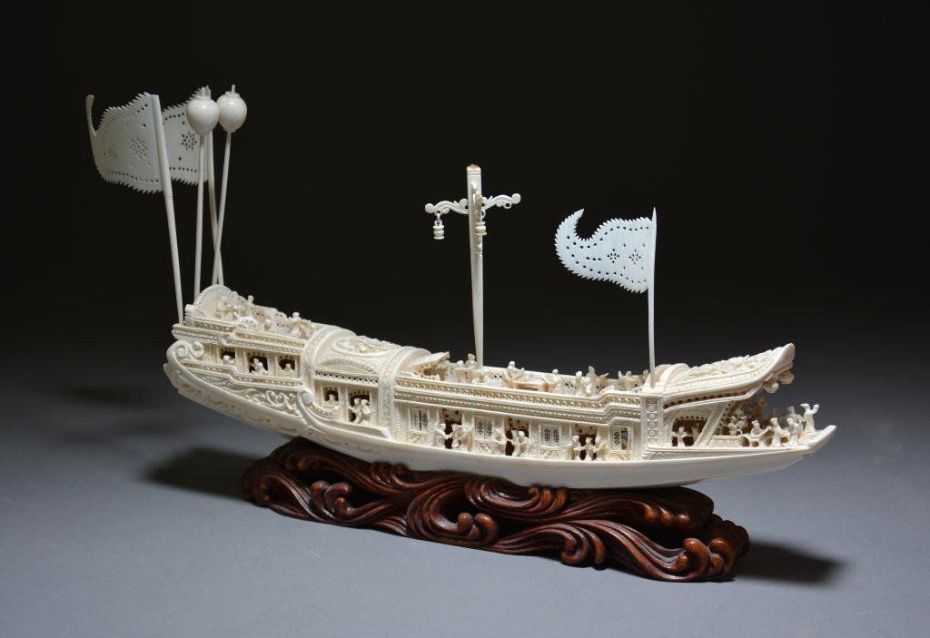 CHINESE CARVED IVORY BOAT WITH FIGURES
