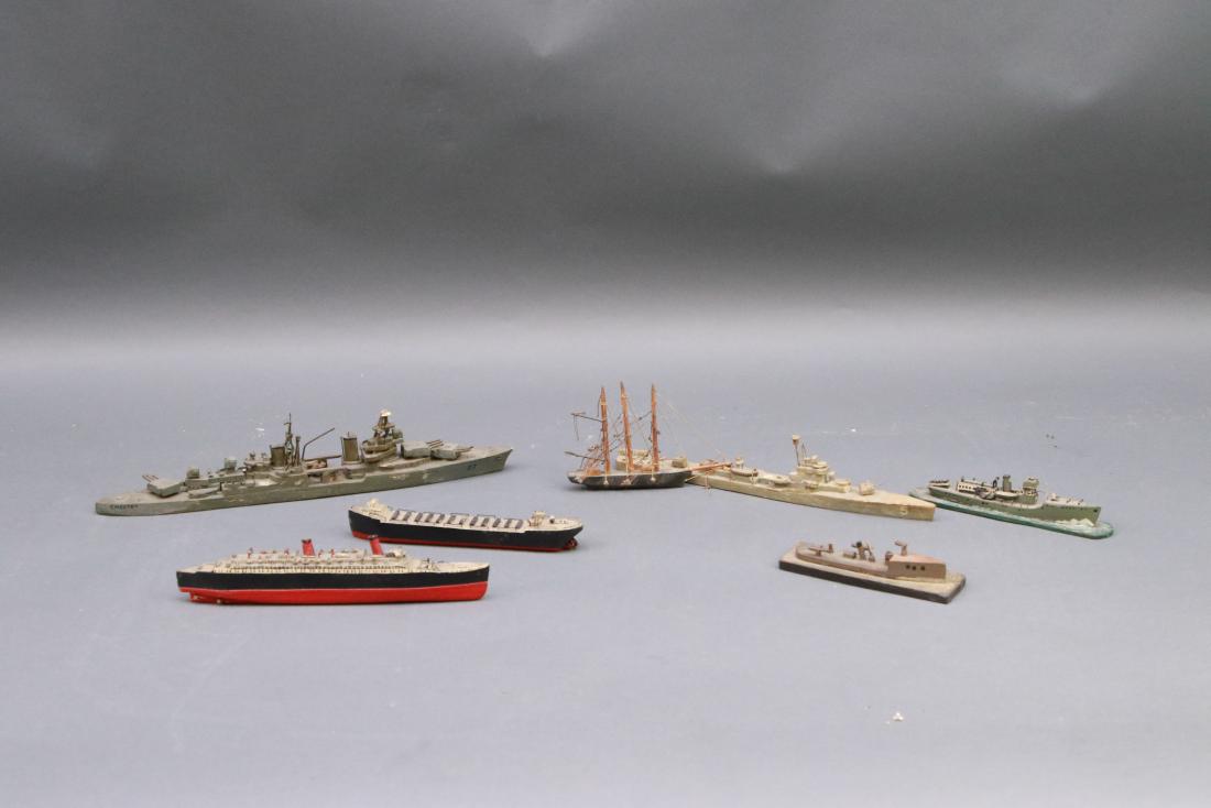 Seven miniature ship models
