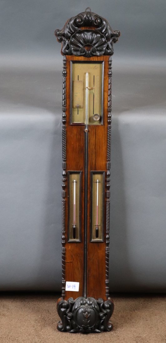 Heavily carved French antique barometer