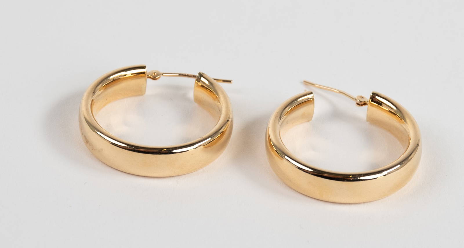 Pair Of 14k Rl Hoop Earrings Auction