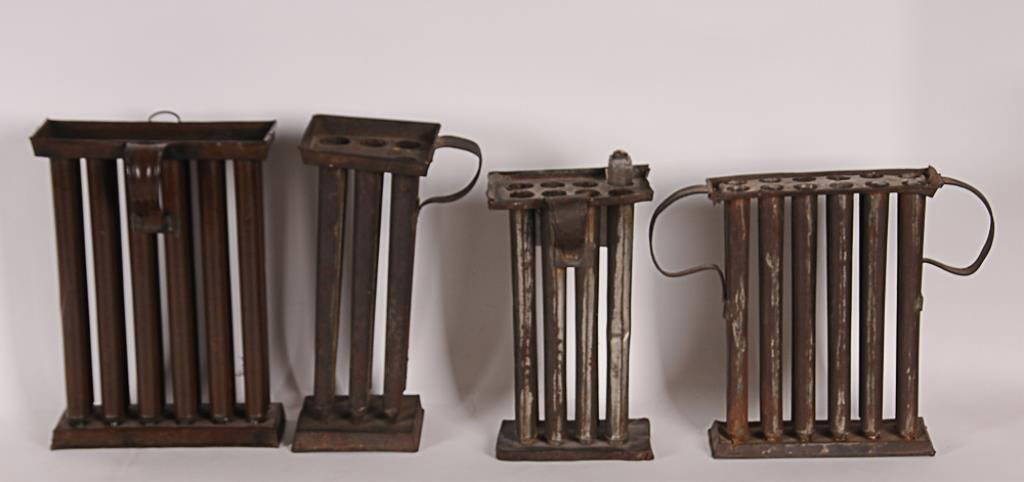 Four Tin Candle Molds