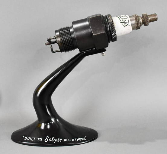 Huge Eclipse Spark Plug Mounted On A Display
