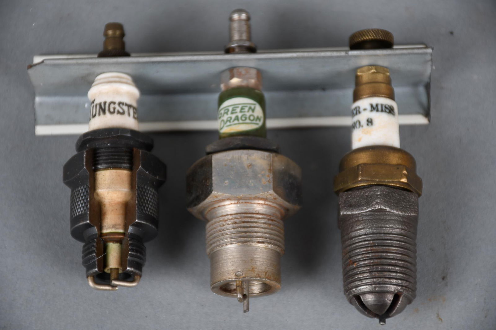 3-spark Plugs Tungsten (cutaway), Green Dragon, Never-miss No. 8 Auction