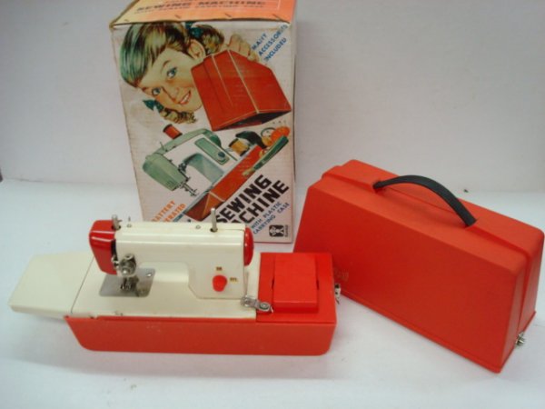 1014: BANDAI Child's Sewing Machine in Case and Box: