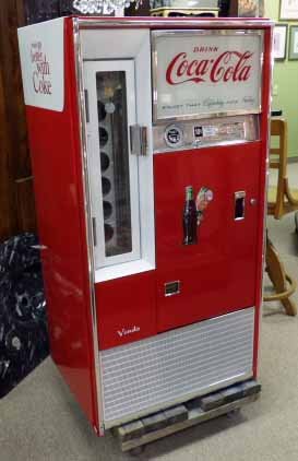 Vendo 65 Coke Machine, model H63B, has keys