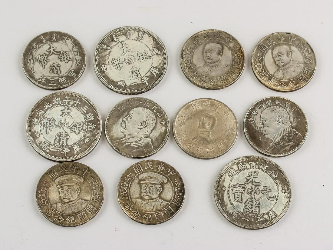 Eleven Assorted Chinese Coins