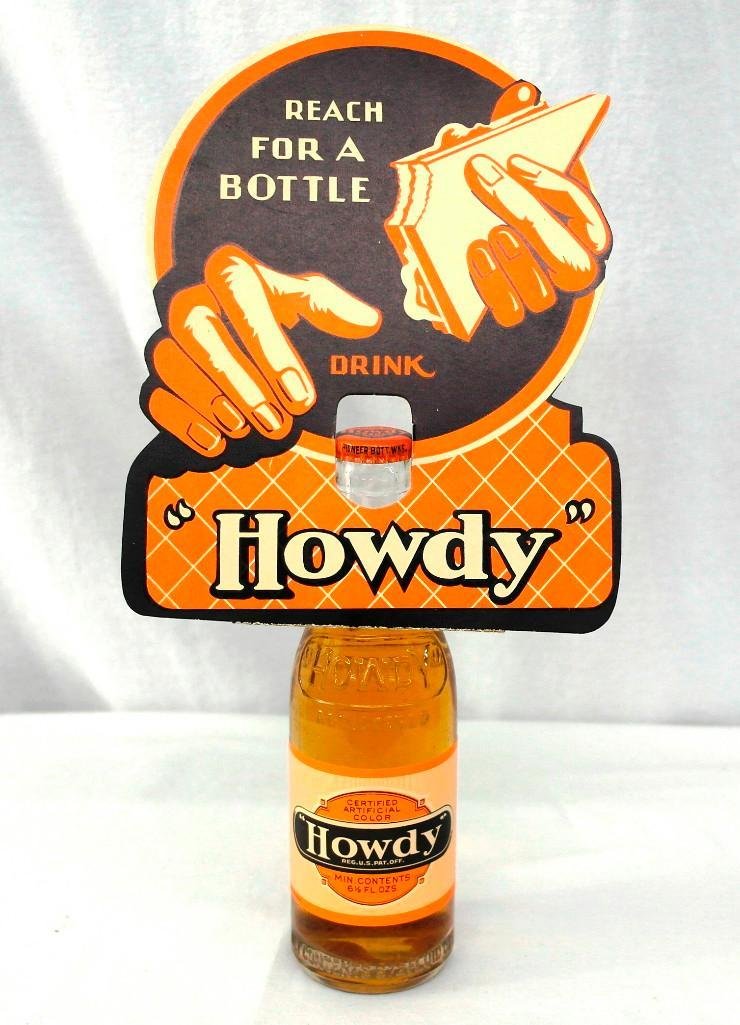 Vintage "Howdy" Orange Soda Bottle and Bottle Ad Topper