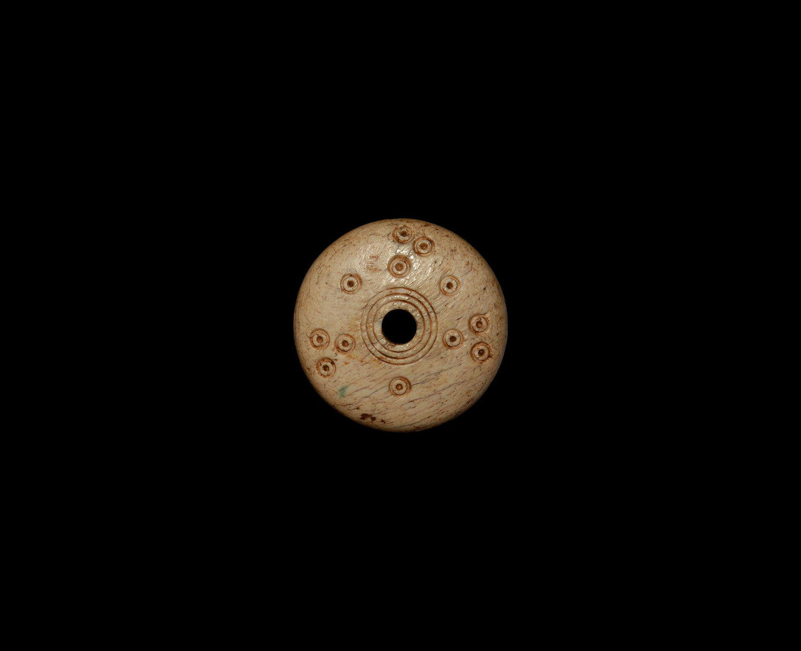 Phoenician Decorated Bone Spindle Whorl