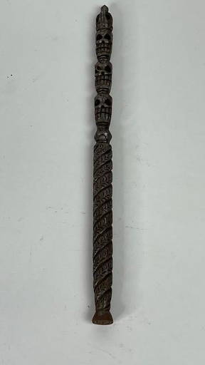 A Wooden Pointing Staff