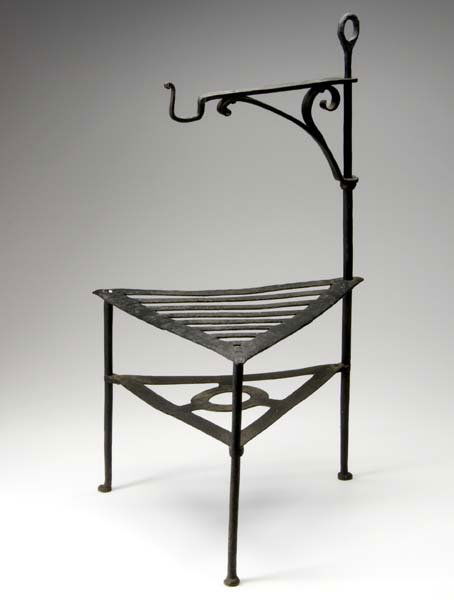 61: MORGAN COLT Wrought-iron fireplace trivet with revo - Oct 27, 2007 ...