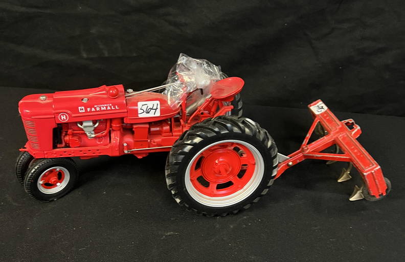 Red Mccormick Tractor And Corn Harvester