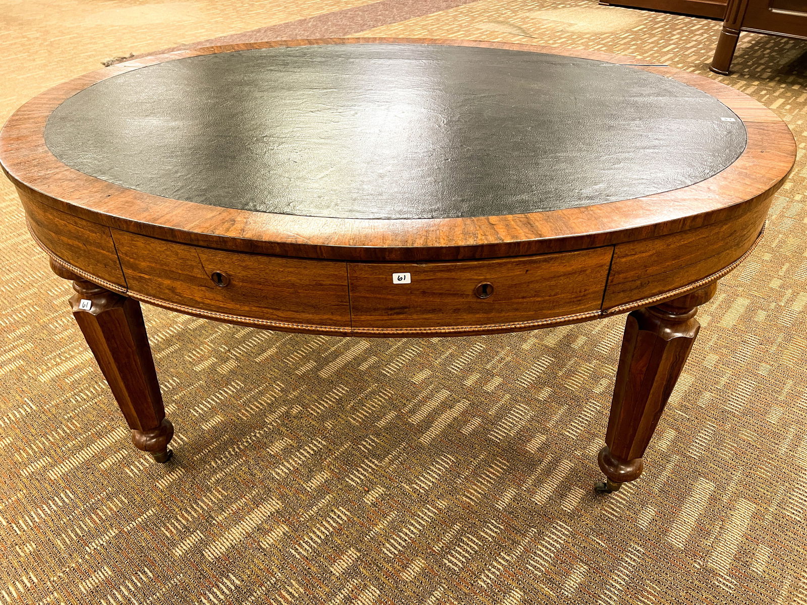 A Victorian Oval Library Table Auction