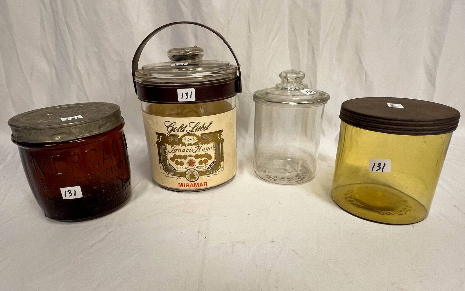 Four Advertising Humidor Cigar Jars Auction
