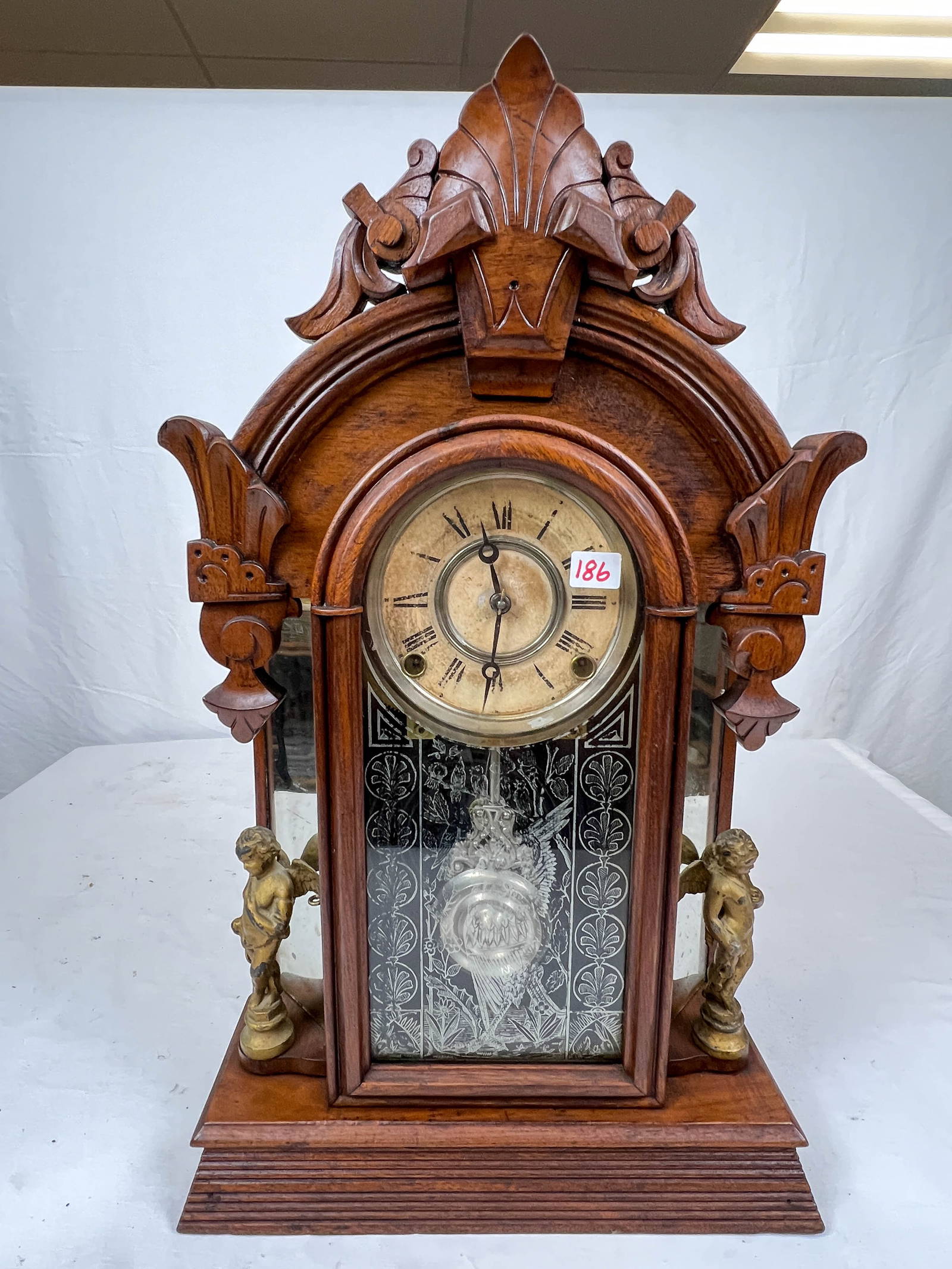 Arch Top Clock With Mirrors And Cupids Auction