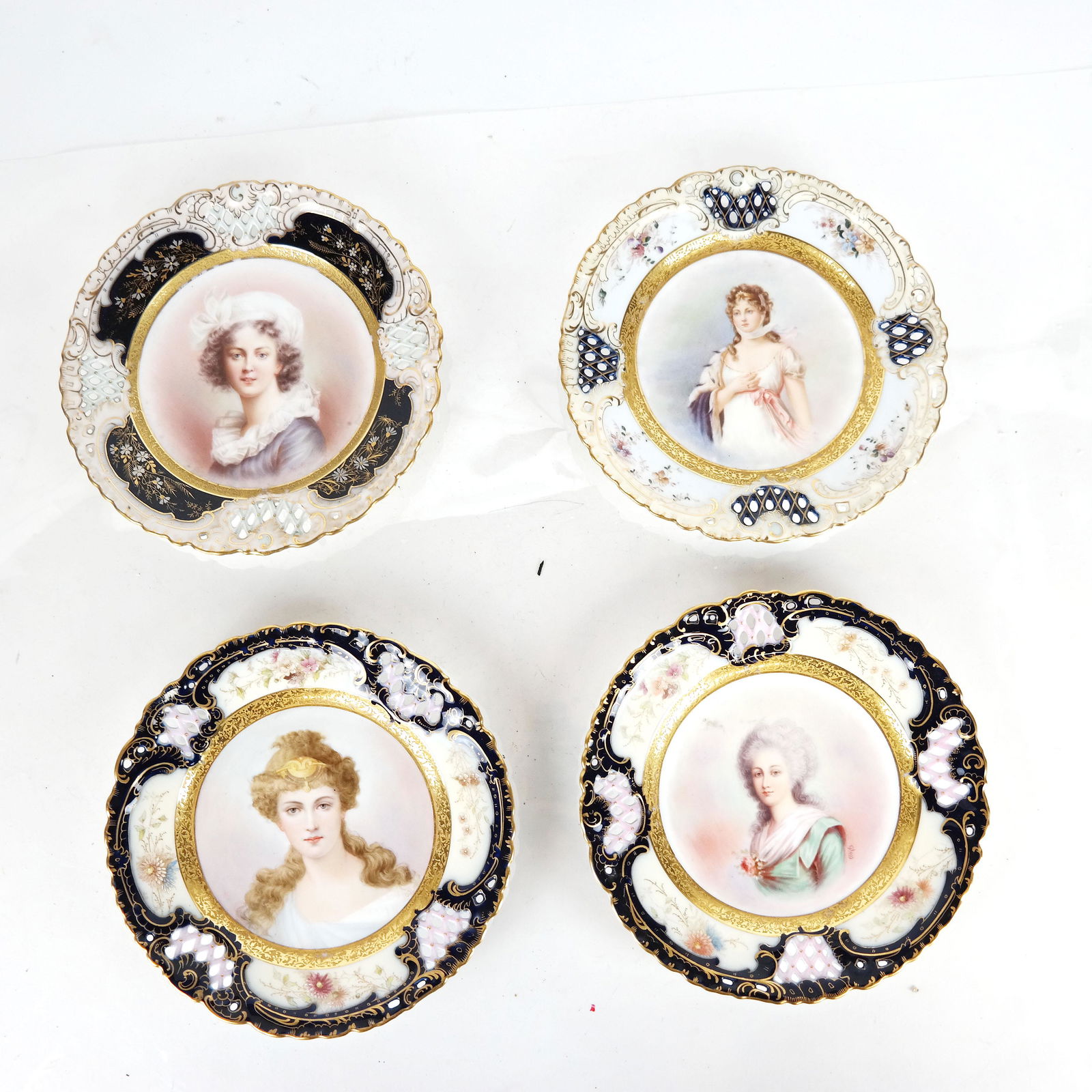 Set Of 4 Porcelain Portrait Plates