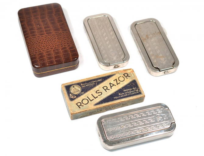 Four Vintage Rolls Razors