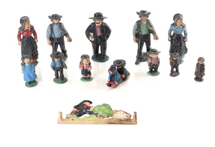 Fifteen Painted Cast Iron Amish Figures