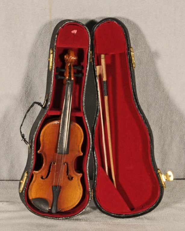 WOOD CARVED MINIATURE VIOLIN. FITTED CASE. GOOD. 7