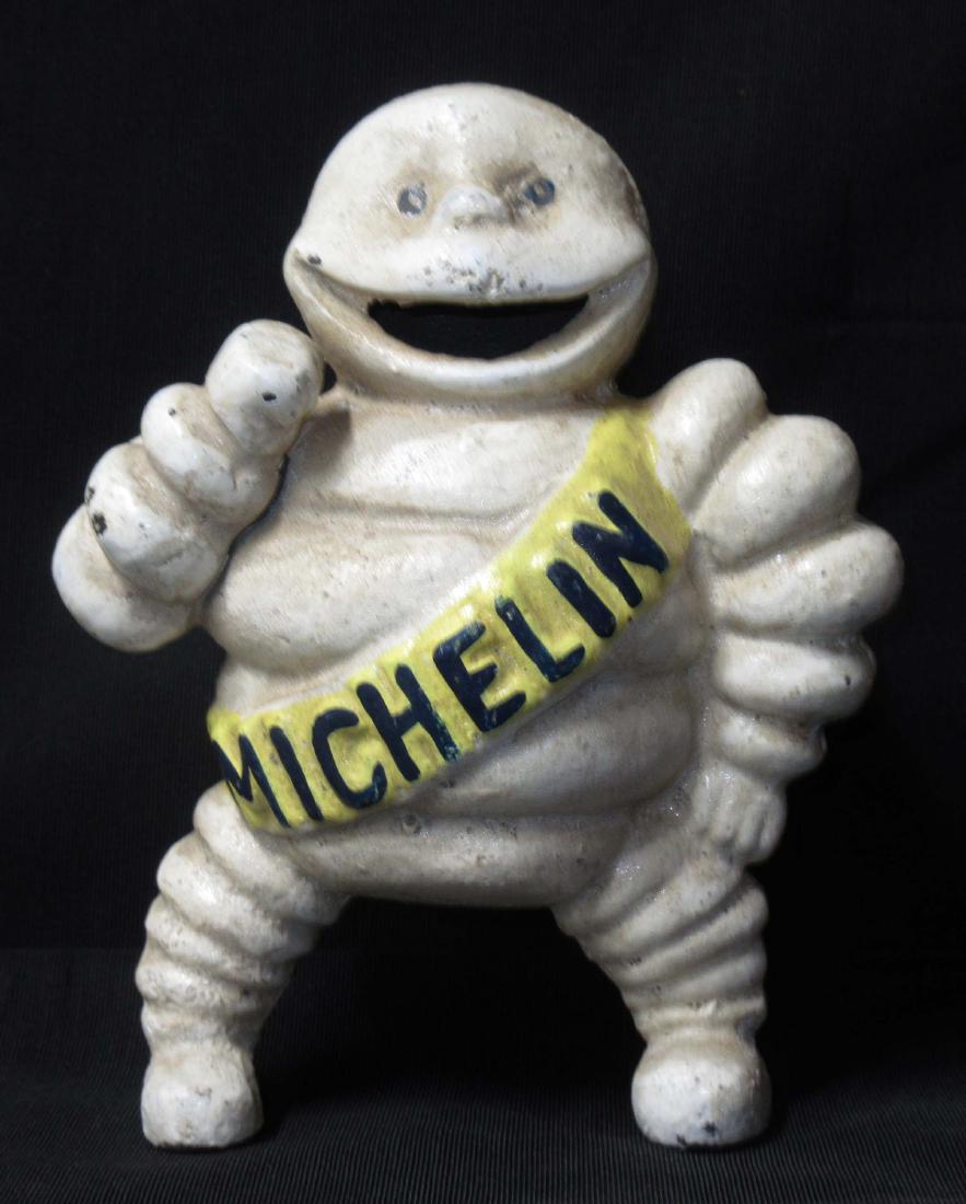 Modern Cast Iron Michelin Man Coin Bank