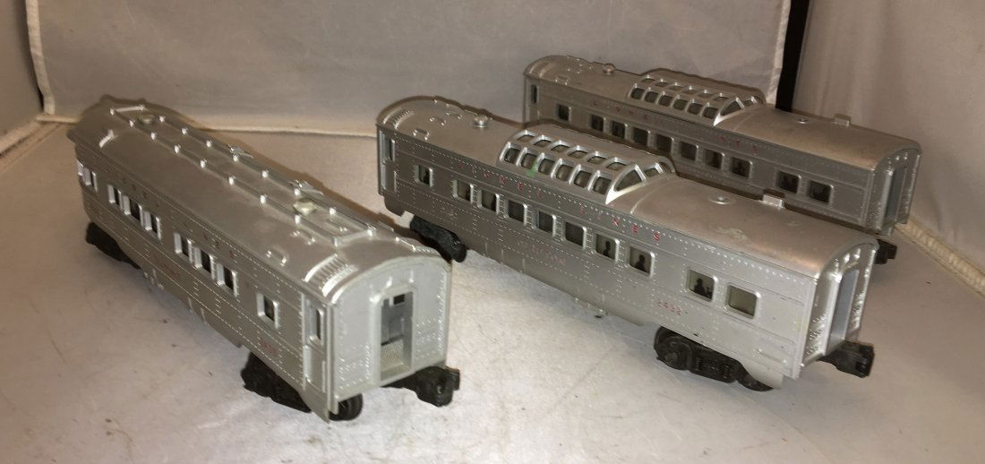 Three Lionel Postwar O Gauge Streamlined Passenger Cars