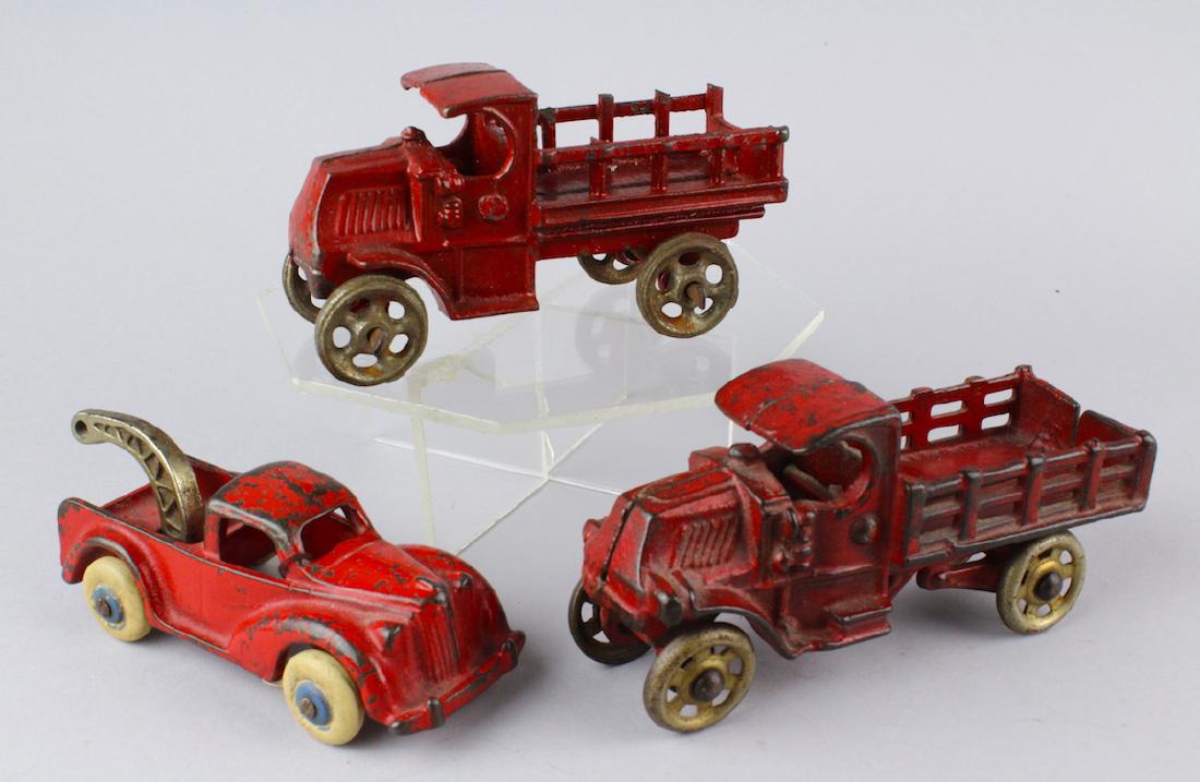 3 Cast Iron Mack Trucks And Tow Truck