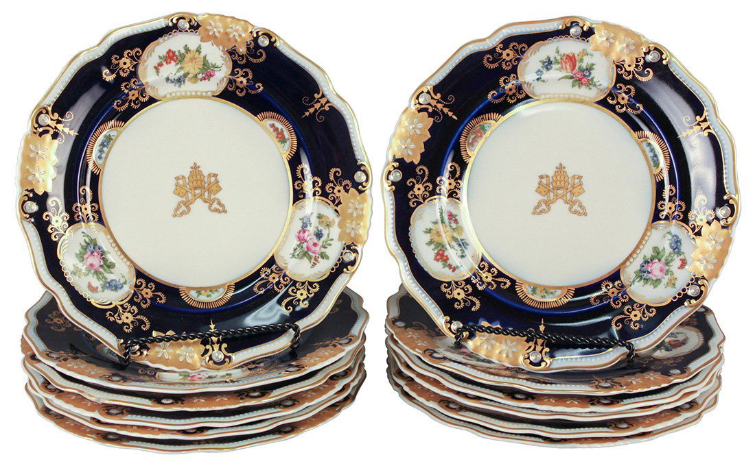 A Set Of 12 Continental Service Plates