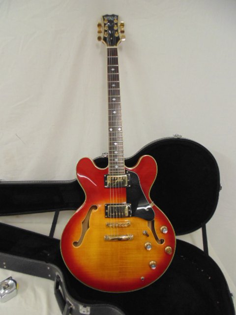 Samick electric guitar in case, serial number S5029967,