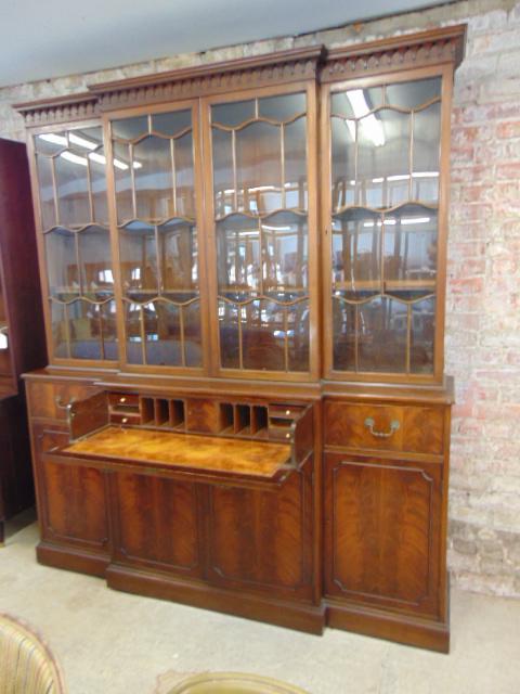 Mahogany breakfront, with pull out desk, leather top work space, two ...