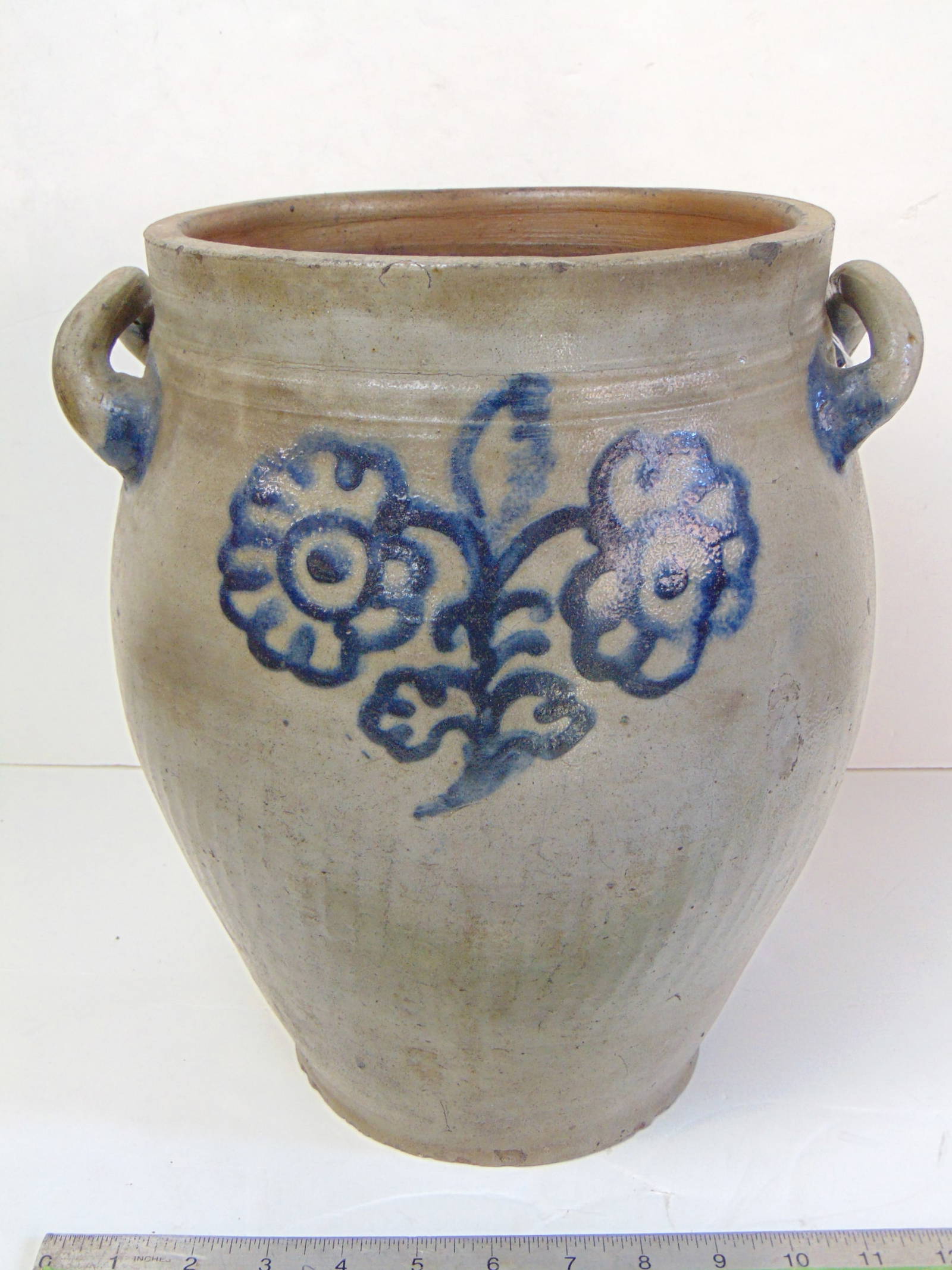 Stoneware Jar With Blue Double Flower Decoration, Open Loop Handles, Ovoid Shape, Has Chip On ...