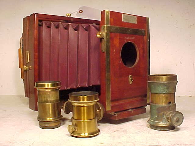 Wood box camera with 3 lenses, American Optical Co.