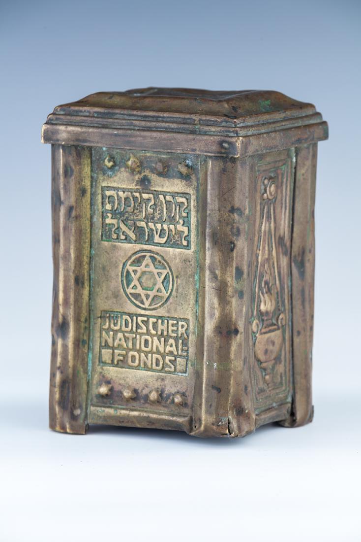 A RARE BRASS JNF CHARITY BOX BY LEOPOLD FLEISCHHACKER.