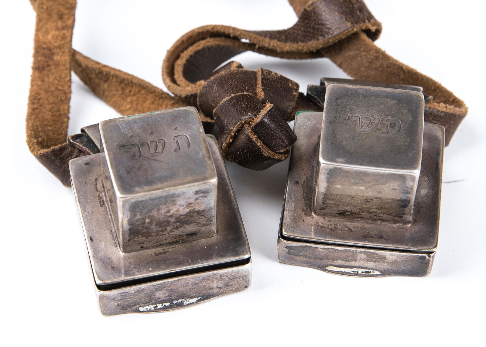 A Pair Of Miniature Tefillin With Early Silver Cases.