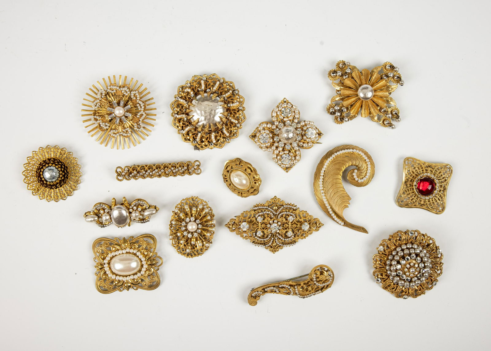 A Group Of 15 Brooches By Miriam Haskell Auction