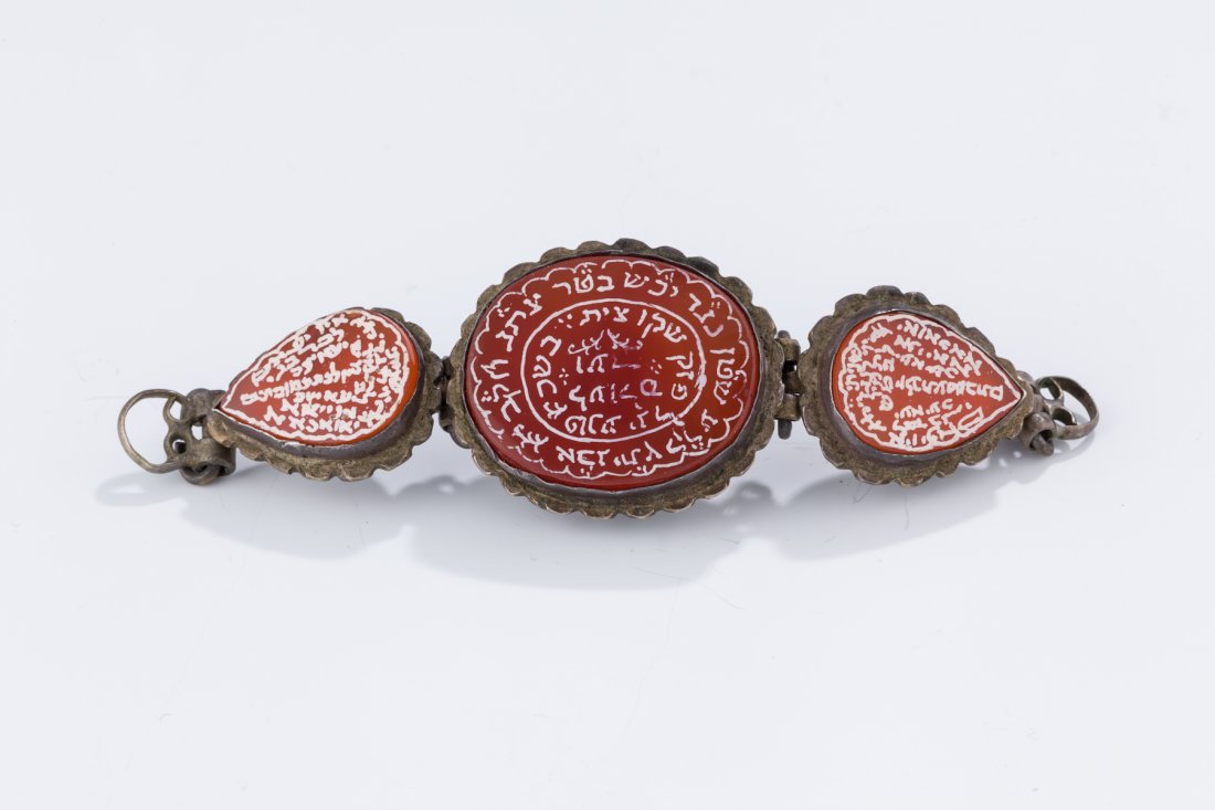 Silver And Cornelian Wrist Amulet.. An Oval Stone