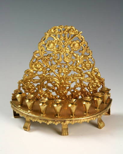 A Gold Menorah. Persian, C. 1920. In Semi Circular