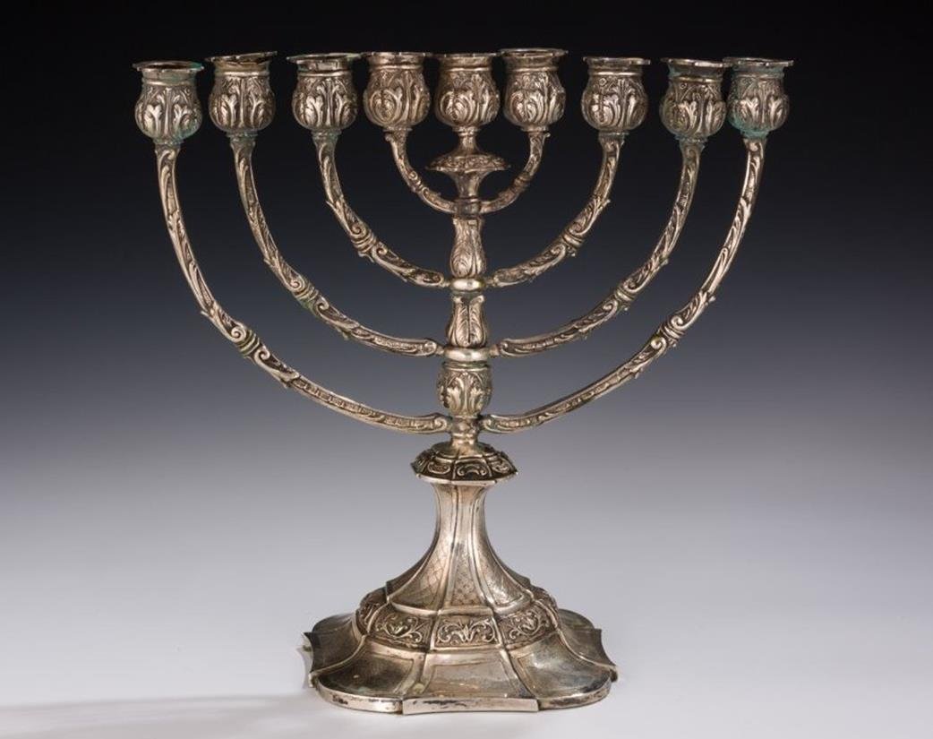 A LARGE STANDING MENORAH. Germany, c.1900. Hand chased