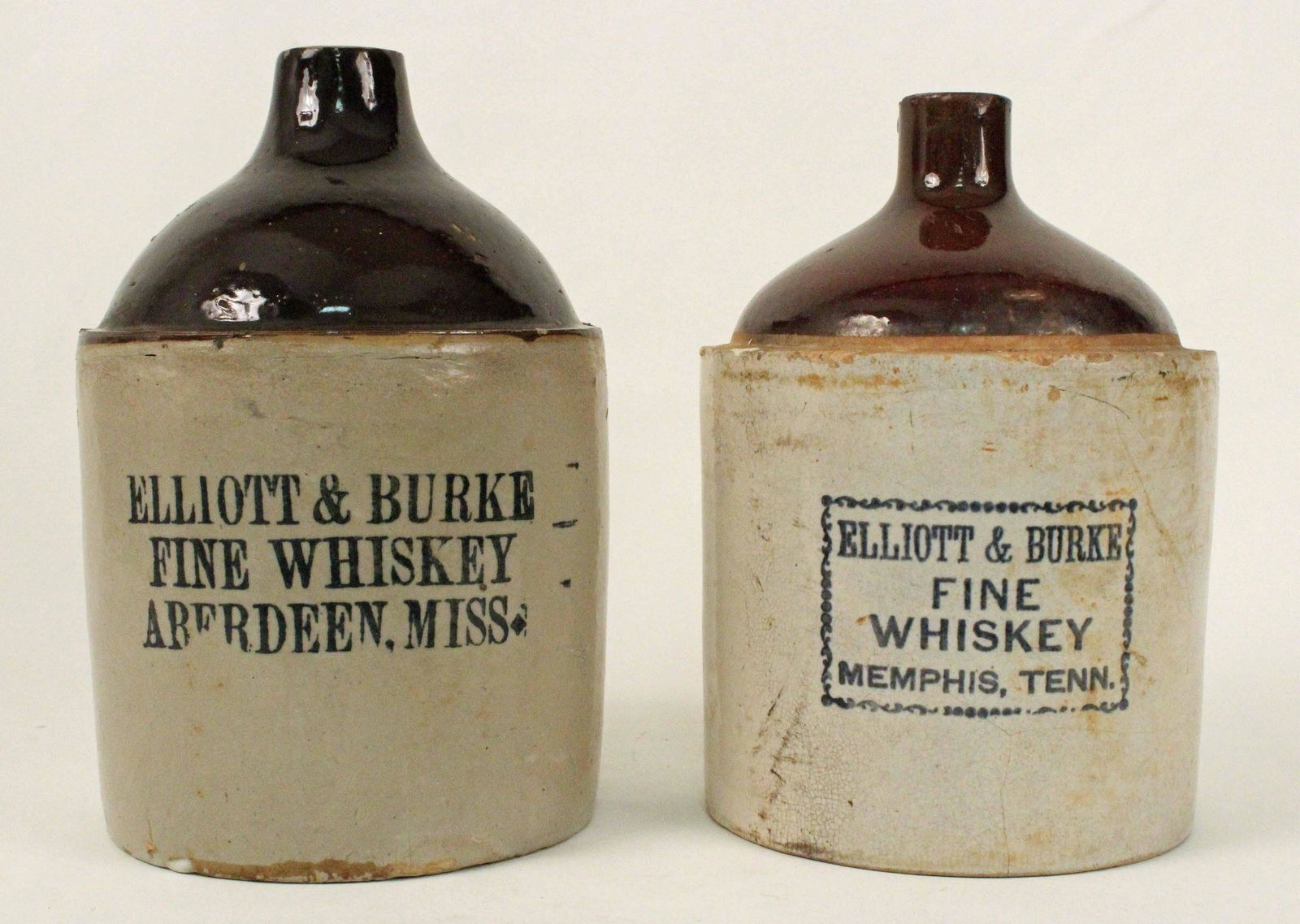 Two Elliot & Burke Stoneware Whiskey Jugs