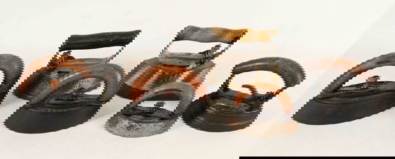 Six Sad Irons With Wooden Handles