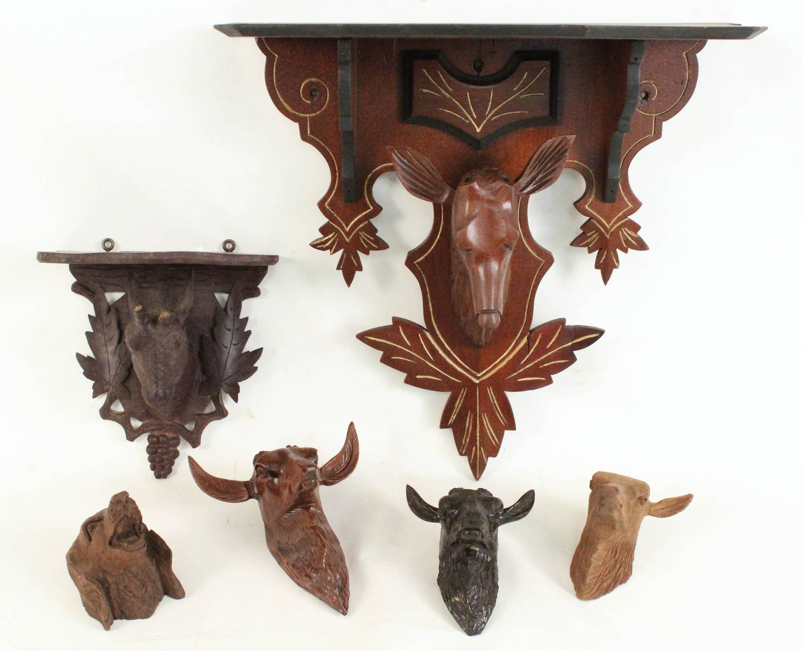 Six Black Forest Carved Animal Heads Auction